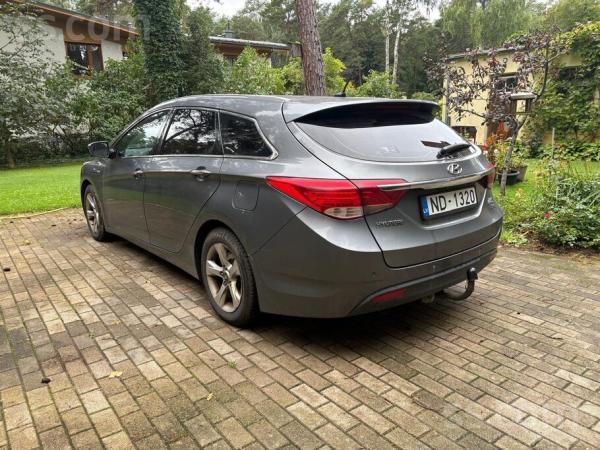 Pelēks Hyundai i40 2014 Rīga, ar dzinēja tilpumu 1.70 L un nobraukumu 450 tūkst. km par 2200 €, foto 5 vietnē AUTOMOTO.COM.LV