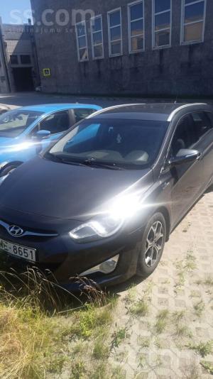Pelēks Hyundai i40 2015 Rīga, ar dzinēja tilpumu 1.60 L un nobraukumu 280 tūkst. km par 2450 €, foto 3 vietnē AUTOMOTO.COM.LV