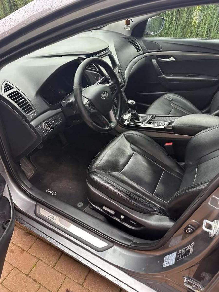 Grey Hyundai i40 2015 in Kaunas, with an engine capacity of 1.69 L and mileage of 266 thousand km for 6200 €, photo 13 on AUTOMOTO.COM.LV