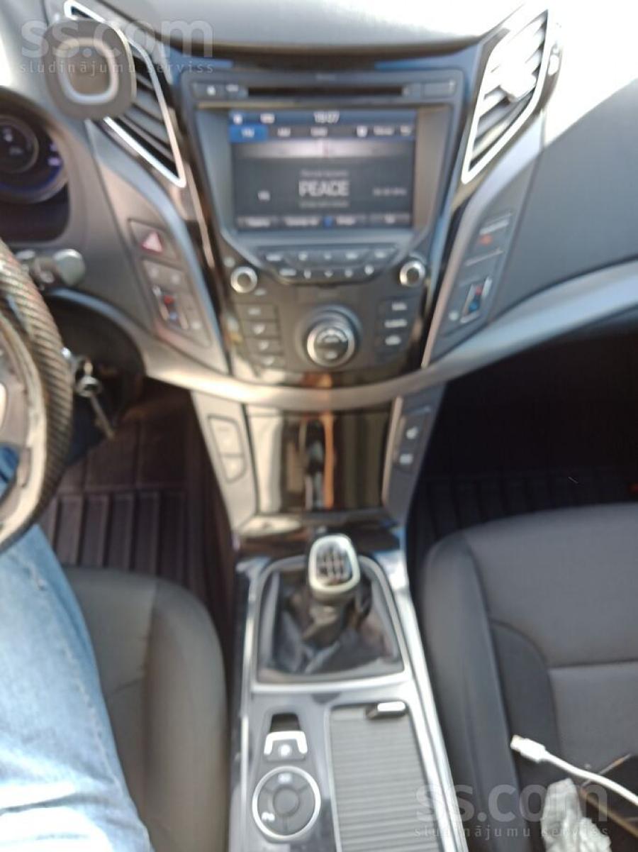 Grey Hyundai i40 2017 in Riga, with an engine capacity of 1.70 L and mileage of 325 thousand km for 6250 €, photo 7 on AUTOMOTO.COM.LV