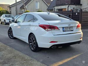 White Hyundai i40 2016 in Radviliskis, with an engine capacity of 1.69 L and mileage of 267 thousand km for 6450 €, photo 10 on AUTOMOTO.COM.LV