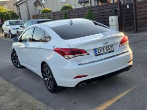 White Hyundai i40 2016 in Radviliskis, with an engine capacity of 1.69 L and mileage of 267 thousand km for 6450 €, photo 11 on AUTOMOTO.COM.LV