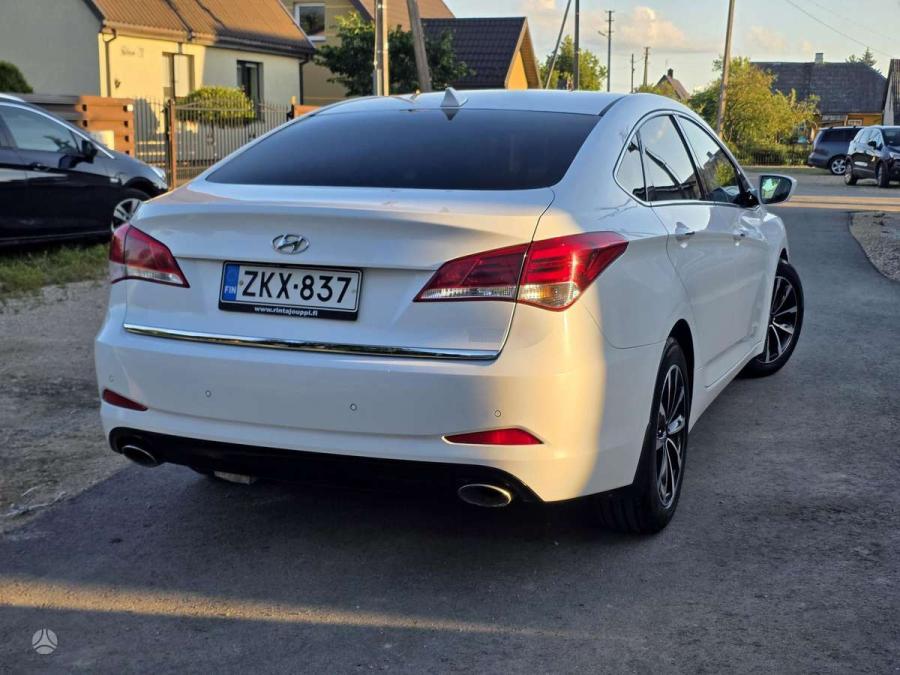 White Hyundai i40 2016 in Radviliskis, with an engine capacity of 1.69 L and mileage of 267 thousand km for 6450 €, photo 13 on AUTOMOTO.COM.LV