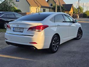 White Hyundai i40 2016 in Radviliskis, with an engine capacity of 1.69 L and mileage of 267 thousand km for 6450 €, photo 14 on AUTOMOTO.COM.LV