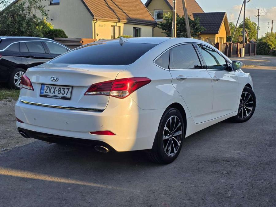 White Hyundai i40 2016 in Radviliskis, with an engine capacity of 1.69 L and mileage of 267 thousand km for 6450 €, photo 14 on AUTOMOTO.COM.LV