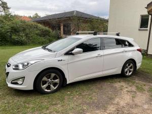 White Hyundai i40 2015 in Vilnius, with an engine capacity of 1.69 L and mileage of 198 thousand km for 6900 €, photo  on AUTOMOTO.COM.LV