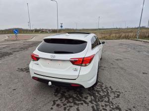 White Hyundai i40 2017 in Panevezys, with an engine capacity of 1.70 L and mileage of 158 thousand km for 7999 €, photo 11 on AUTOMOTO.COM.LV