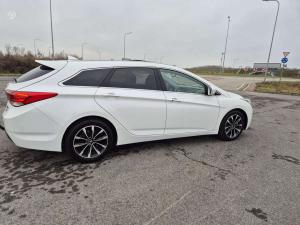White Hyundai i40 2017 in Panevezys, with an engine capacity of 1.70 L and mileage of 158 thousand km for 7999 €, photo 16 on AUTOMOTO.COM.LV