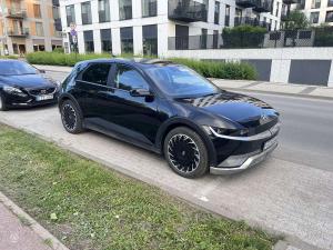 Black Hyundai Ioniq 5 2024 in Vilnius, with an engine capacity of 0.00 L and mileage of 16 thousand km for 24999 €, photo  on AUTOMOTO.COM.LV