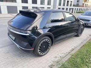 Black Hyundai Ioniq 5 2024 in Vilnius, with an engine capacity of 0.00 L and mileage of 16 thousand km for 24999 €, photo 3 on AUTOMOTO.COM.LV