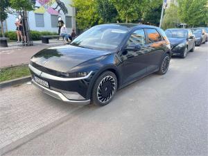 Black Hyundai Ioniq 5 2024 in Vilnius, with an engine capacity of 0.00 L and mileage of 16 thousand km for 24999 €, photo 5 on AUTOMOTO.COM.LV