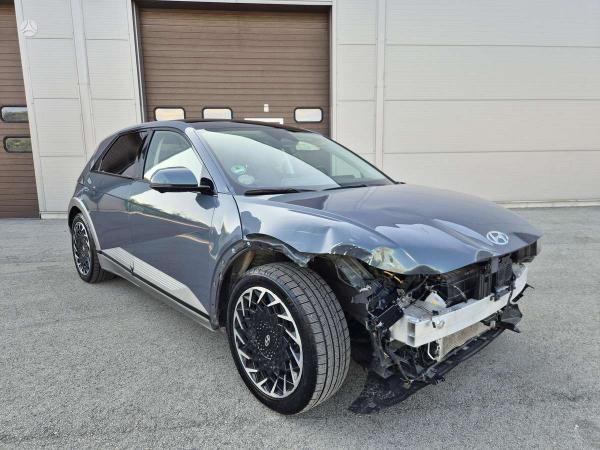 Zils Hyundai Ioniq 5 2024 Mažeikiai, ar dzinēja tilpumu 0.00 L un nobraukumu 81 tūkst. km par 21900 €, foto 4 vietnē AUTOMOTO.COM.LV