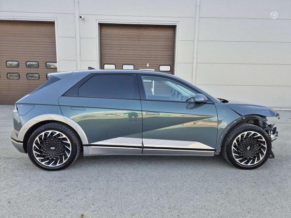 Zils Hyundai Ioniq 5 2024 Mažeikiai, ar dzinēja tilpumu 0.00 L un nobraukumu 81 tūkst. km par 21900 €, foto 5 vietnē AUTOMOTO.COM.LV
