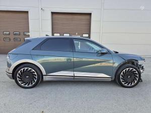 Zils Hyundai Ioniq 5 2024 Mažeikiai, ar dzinēja tilpumu 0.00 L un nobraukumu 81 tūkst. km par 21900 €, foto 6 vietnē AUTOMOTO.COM.LV