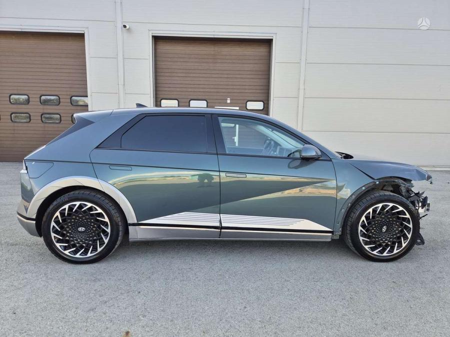 Zils Hyundai Ioniq 5 2024 Mažeikiai, ar dzinēja tilpumu 0.00 L un nobraukumu 81 tūkst. km par 21900 €, foto 6 vietnē AUTOMOTO.COM.LV