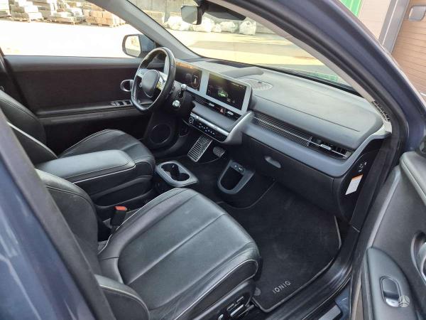 Zils Hyundai Ioniq 5 2024 Mažeikiai, ar dzinēja tilpumu 0.00 L un nobraukumu 81 tūkst. km par 21900 €, foto 10 vietnē AUTOMOTO.COM.LV