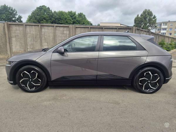 Brown Hyundai Ioniq 5 2022 in Mazeikiai, with an engine capacity of 0.00 L and mileage of 50 thousand km for 16900 €, photo 2 on AUTOMOTO.COM.LV