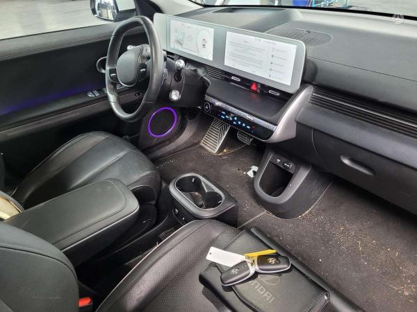 Grey Hyundai Ioniq 5 2023 in Kaunas, with an engine capacity of 0.00 L and mileage of 70 thousand km for 19900 €, photo 6 on AUTOMOTO.COM.LV