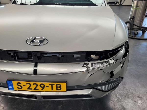 Grey Hyundai Ioniq 5 2023 in Kaunas, with an engine capacity of 0.00 L and mileage of 70 thousand km for 19900 €, photo 9 on AUTOMOTO.COM.LV