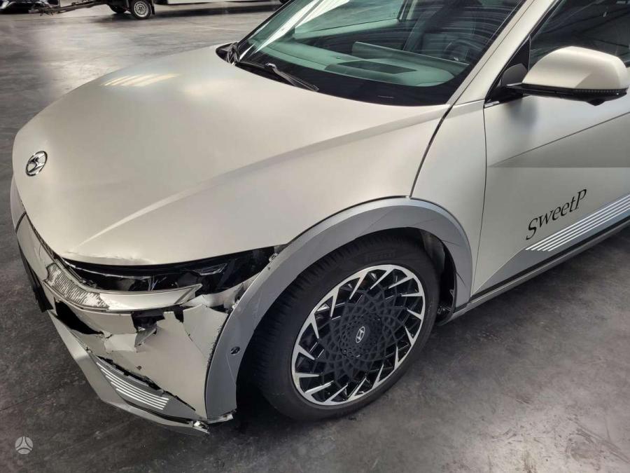 Серый Хендай Ioniq 5 2023 в Каунас, объемом двигателя 0.00 л и пробегом 70 тыс. км за 19900 €, фото 27 на AUTOMOTO.COM.LV