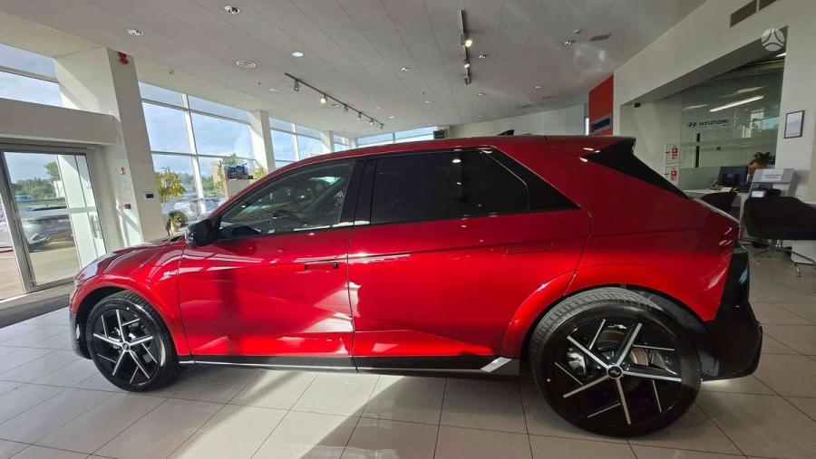 Sarkans Hyundai Ioniq 5 2026 Kauņa, ar dzinēja tilpumu 0.00 L un nobraukumu 0 tūkst. km par 59999 €, foto 4 vietnē AUTOMOTO.COM.LV