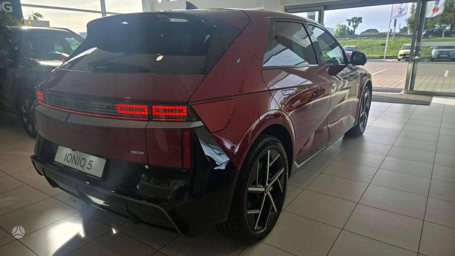 Sarkans Hyundai Ioniq 5 2026 Kauņa, ar dzinēja tilpumu 0.00 L un nobraukumu 0 tūkst. km par 59999 €, foto 6 vietnē AUTOMOTO.COM.LV
