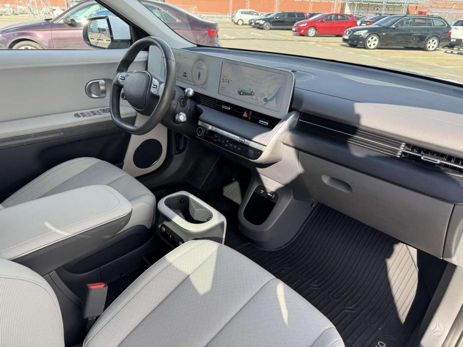 Белый Хендай Ioniq 5 2021 в Каунас, объемом двигателя 0.00 л и пробегом 77 тыс. км за 26200 €, фото 10 на AUTOMOTO.COM.LV