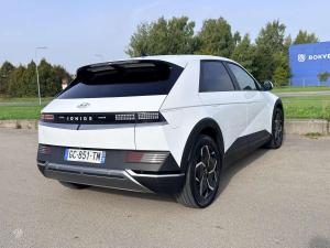 White Hyundai Ioniq 5 2021 in Panevezys, with an engine capacity of 0.00 L and mileage of 114 thousand km for 22990 €, photo 13 on AUTOMOTO.COM.LV