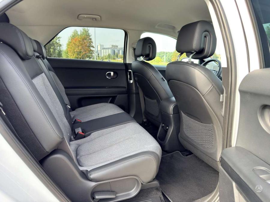 White Hyundai Ioniq 5 2021 in Panevezys, with an engine capacity of 0.00 L and mileage of 114 thousand km for 22990 €, photo 14 on AUTOMOTO.COM.LV