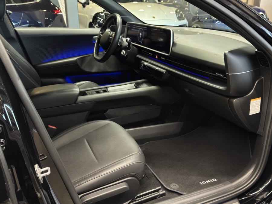 Black Hyundai Ioniq 2023 in Riga, with an engine capacity of 0.00 L and mileage of 77 thousand km for 31990 €, photo 11 on AUTOMOTO.COM.LV