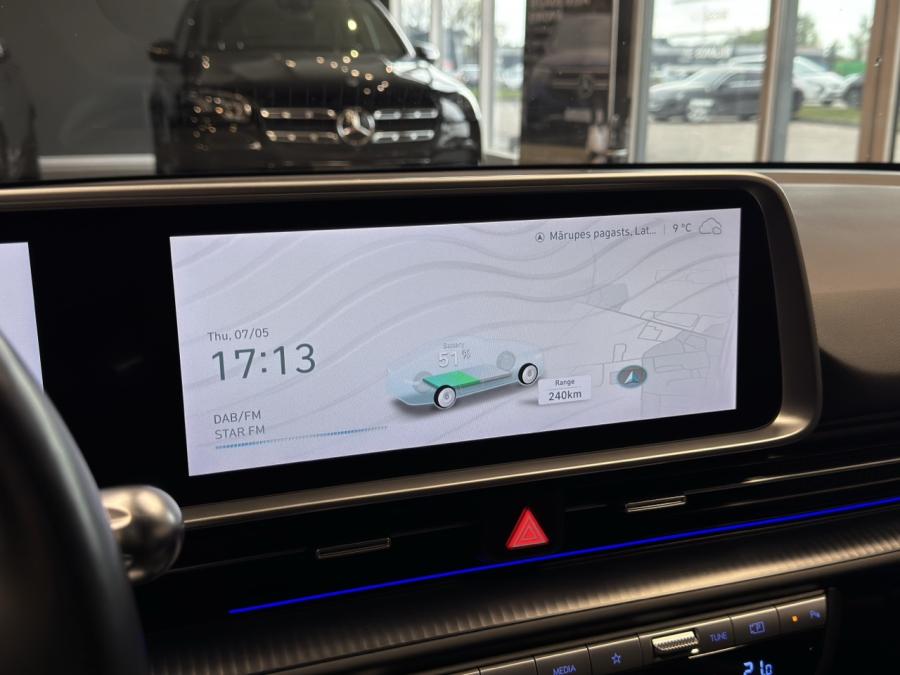 Black Hyundai Ioniq 2023 in Riga, with an engine capacity of 0.00 L and mileage of 77 thousand km for 31990 €, photo 16 on AUTOMOTO.COM.LV