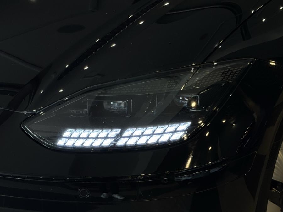 Black Hyundai Ioniq 2023 in Riga, with an engine capacity of 0.00 L and mileage of 77 thousand km for 31990 €, photo 32 on AUTOMOTO.COM.LV