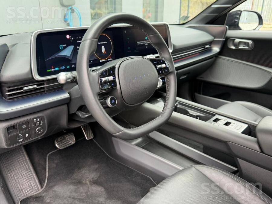 Black Hyundai Ioniq 2024 in Riga, with an engine capacity of 1.80 L and mileage of 27 thousand km for 42000 €, photo 7 on AUTOMOTO.COM.LV