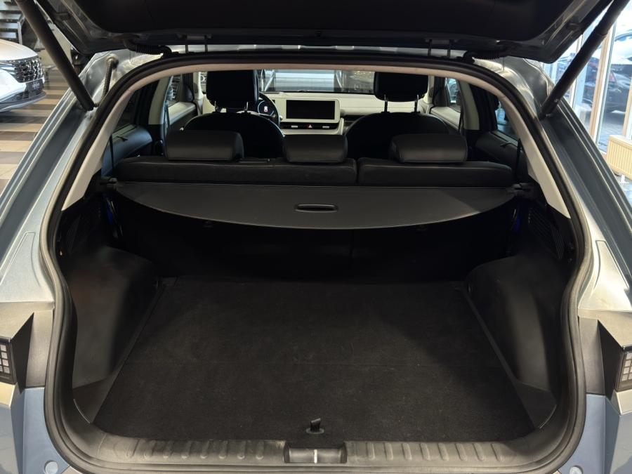 Blue Hyundai Ioniq 2022 in Riga, with an engine capacity of 0.00 L and mileage of 128 thousand km for 26990 €, photo 7 on AUTOMOTO.COM.LV