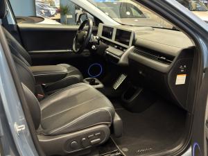 Blue Hyundai Ioniq 2022 in Riga, with an engine capacity of 0.00 L and mileage of 128 thousand km for 26990 €, photo 13 on AUTOMOTO.COM.LV