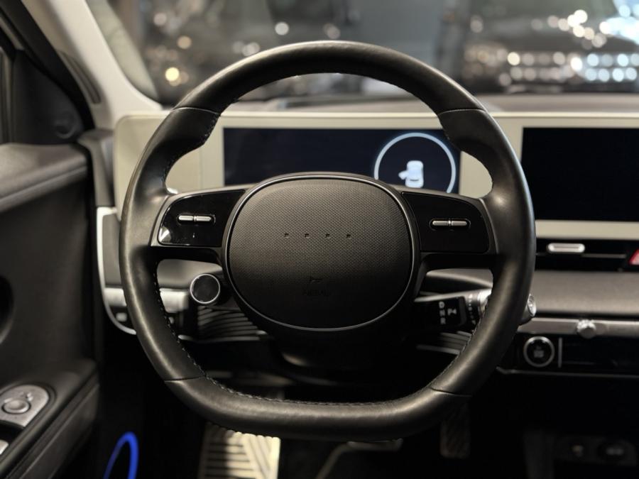 Grey Hyundai Ioniq 2022 in Riga, with an engine capacity of 0.00 L and mileage of 63 thousand km for 31990 €, photo 18 on AUTOMOTO.COM.LV