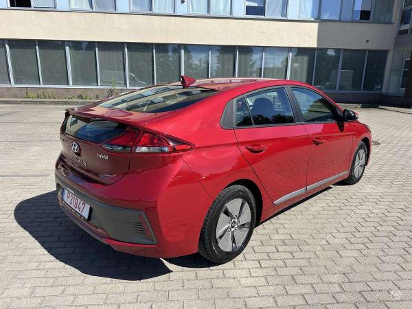 Red Hyundai Ioniq 2022 in Kaunas, with an engine capacity of 1.58 L and mileage of 80 thousand km for 12900 €, photo 3 on AUTOMOTO.COM.LV