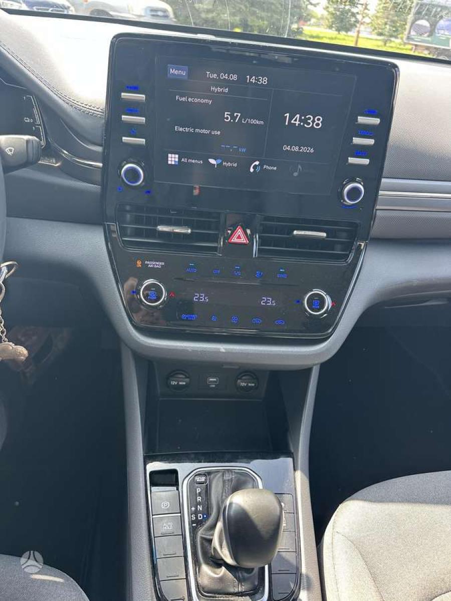 Red Hyundai Ioniq 2022 in Kaunas, with an engine capacity of 1.58 L and mileage of 80 thousand km for 12900 €, photo 12 on AUTOMOTO.COM.LV