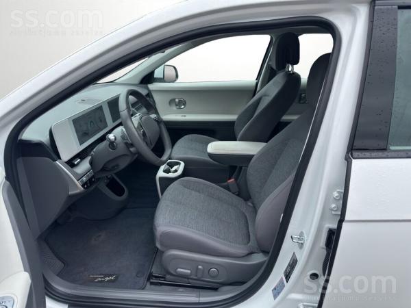 White Hyundai Ioniq 2023 in Riga, with an engine capacity of 1.60 L and mileage of 51 thousand km for 30490 €, photo 9 on AUTOMOTO.COM.LV