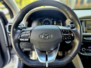 White Hyundai Ioniq 2018 in Taurage, with an engine capacity of 1.58 L and mileage of 177 thousand km for 8900 €, photo 18 on AUTOMOTO.COM.LV