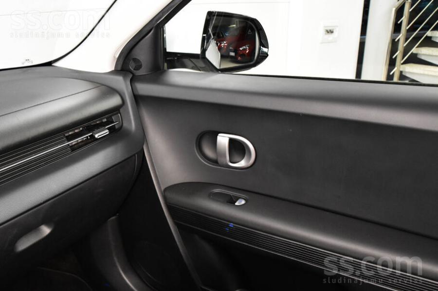 White Hyundai Ioniq 2022 in Riga, with an engine capacity of 0.00 L and mileage of 123 thousand km for 25990 €, photo 15 on AUTOMOTO.COM.LV