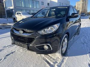 Black Hyundai ix35 2010 in Kaunas, with an engine capacity of 2.00 L and mileage of 223 thousand km for 4250 €, photo  on AUTOMOTO.COM.LV