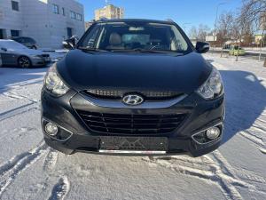 Black Hyundai ix35 2010 in Kaunas, with an engine capacity of 2.00 L and mileage of 223 thousand km for 4250 €, photo 4 on AUTOMOTO.COM.LV