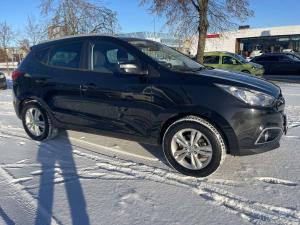 Black Hyundai ix35 2010 in Kaunas, with an engine capacity of 2.00 L and mileage of 223 thousand km for 4250 €, photo 7 on AUTOMOTO.COM.LV