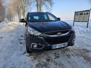 Black Hyundai ix35 2010 in Taurage, with an engine capacity of 1.70 L and mileage of 209 thousand km for 5400 €, photo 4 on AUTOMOTO.COM.LV