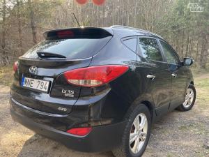 Melns Hyundai ix35 2010 Viļņa, ar dzinēja tilpumu 2.00 L un nobraukumu 235 tūkst. km par 4950 €, foto 6 vietnē AUTOMOTO.COM.LV