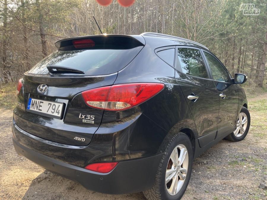 Melns Hyundai ix35 2010 Viļņa, ar dzinēja tilpumu 2.00 L un nobraukumu 235 tūkst. km par 4950 €, foto 6 vietnē AUTOMOTO.COM.LV