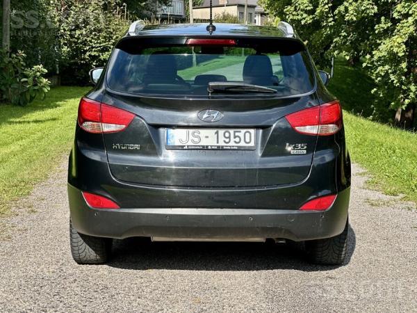 Melns Hyundai ix35 2010 Talsi, ar dzinēja tilpumu 2.00 L un nobraukumu 227 tūkst. km par 5970 €, foto 3 vietnē AUTOMOTO.COM.LV