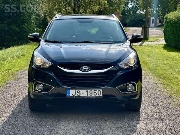 Melns Hyundai ix35 2010 Talsi, ar dzinēja tilpumu 2.00 L un nobraukumu 227 tūkst. km par 5970 €, foto 6 vietnē AUTOMOTO.COM.LV