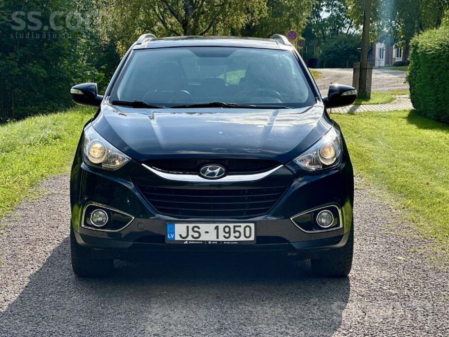 Melns Hyundai ix35 2010 Talsi, ar dzinēja tilpumu 2.00 L un nobraukumu 227 tūkst. km par 5970 €, foto 7 vietnē AUTOMOTO.COM.LV